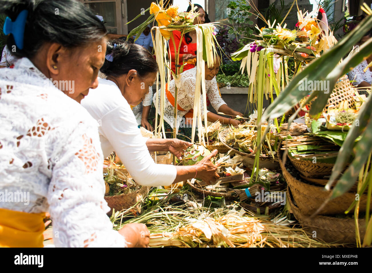 Procession of beautiful Balinese women in traditional costumes - sarong ...