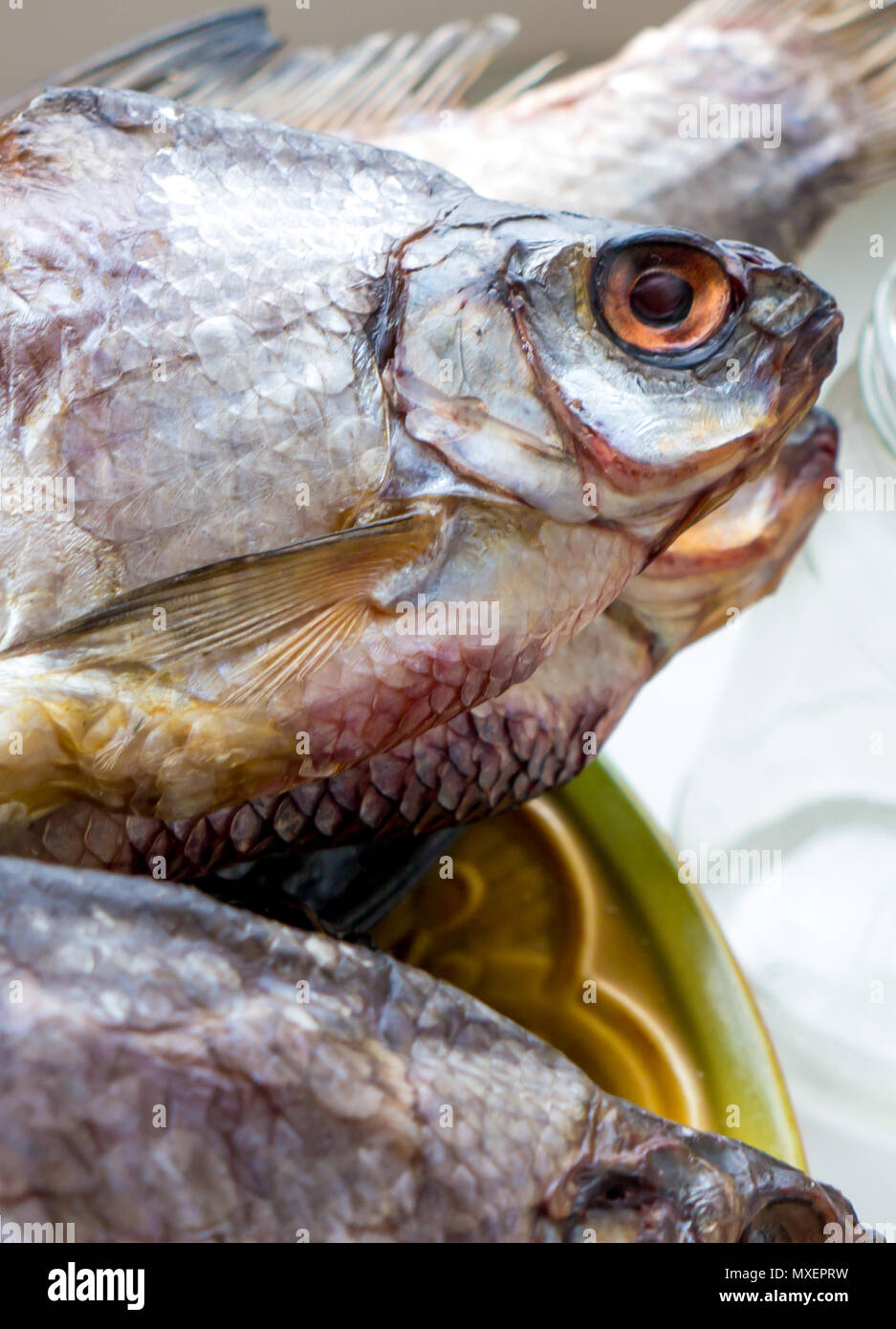 The Dried Fish on a color background Stock Photo - Alamy