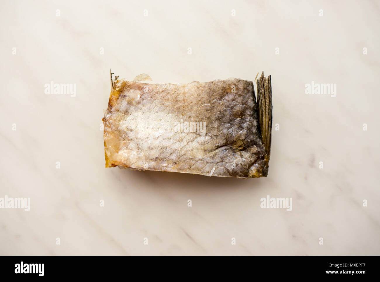 The Dried Fish on a color background Stock Photo - Alamy