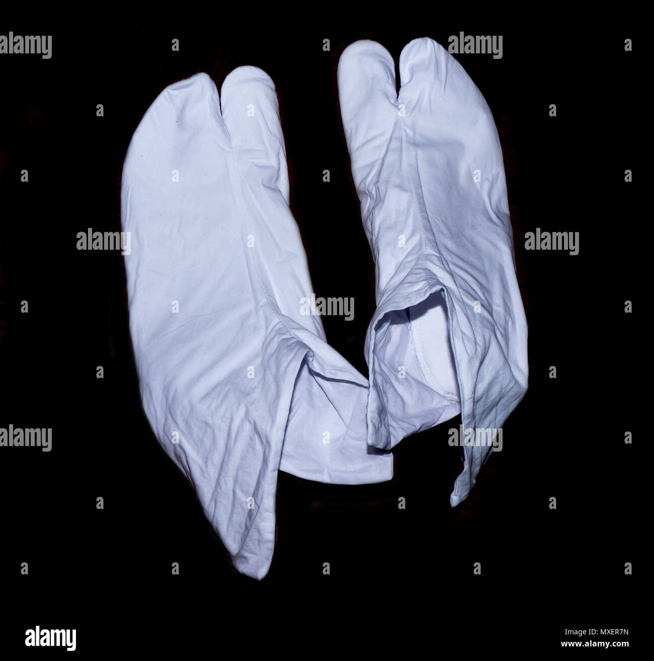 The Japanese tabi on a black background Stock Photo - Alamy
