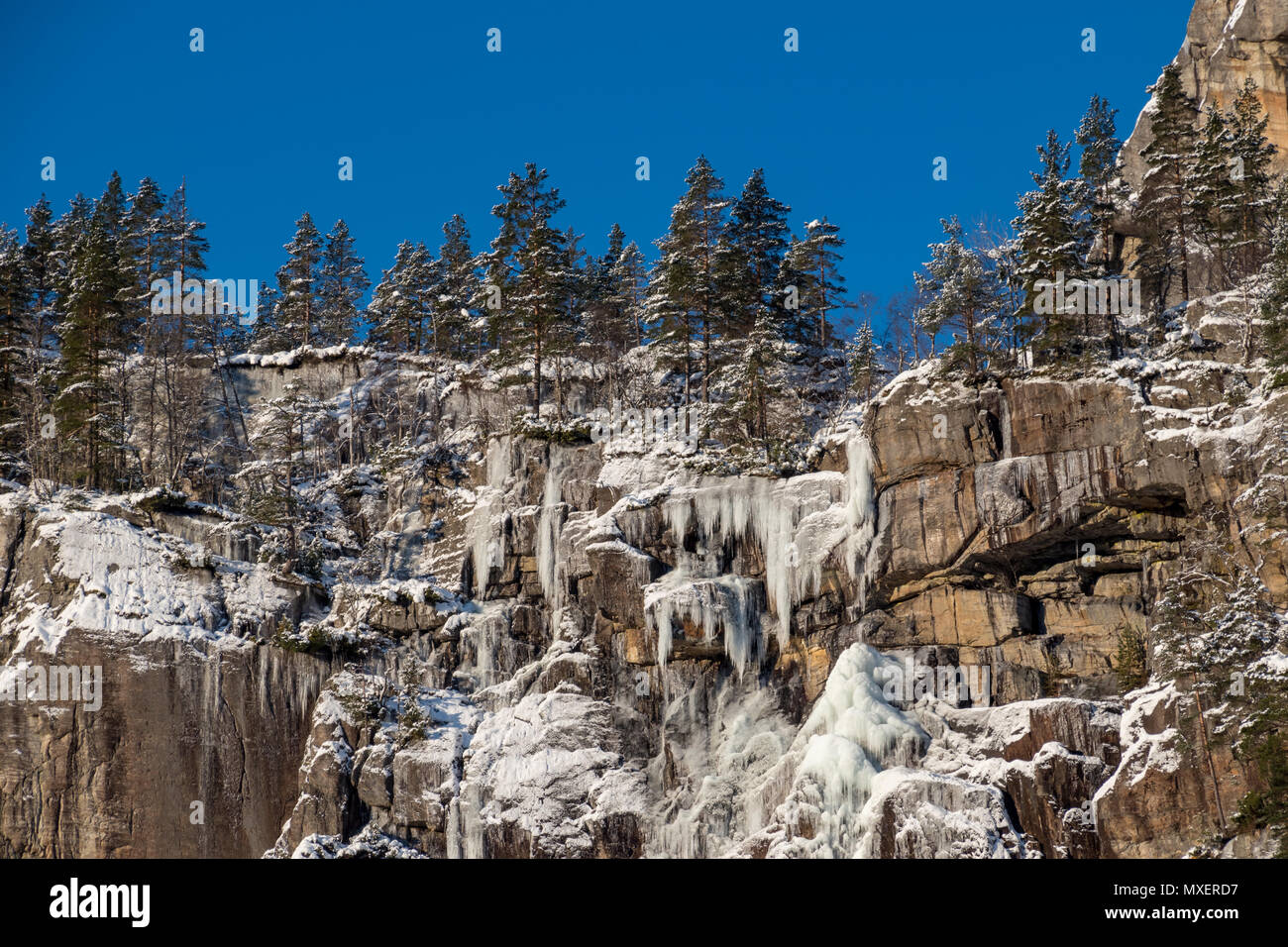 Icicle rock formation canyon trees sunny Stock Photo - Alamy