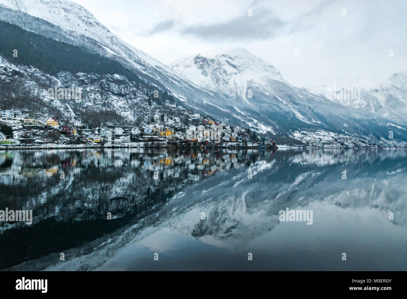 Reflection of Odda in Norway on lake Stock Photo - Alamy