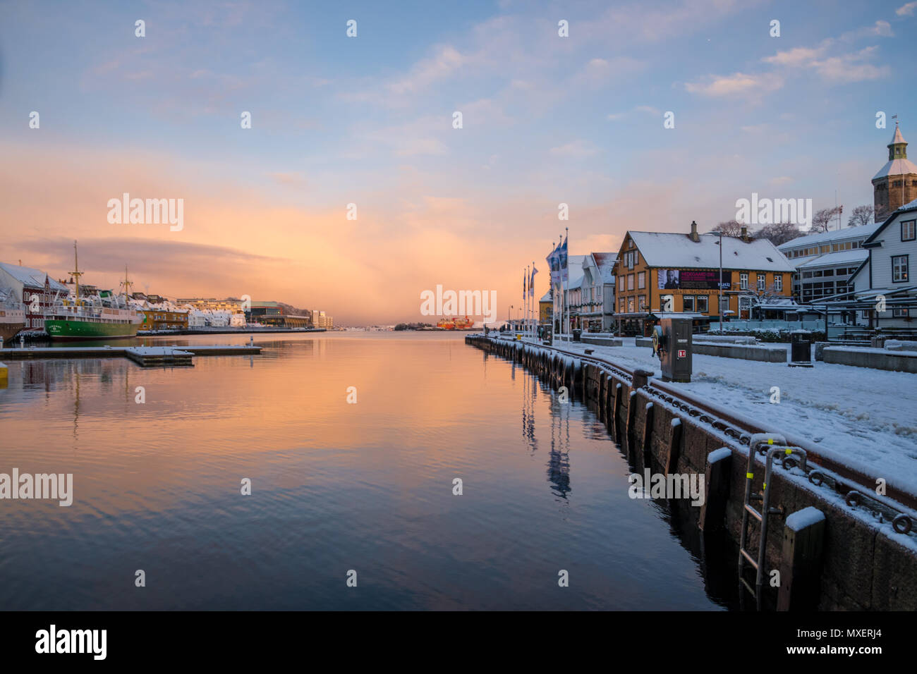 Stavanger city center port sunrise reflection Stock Photo - Alamy