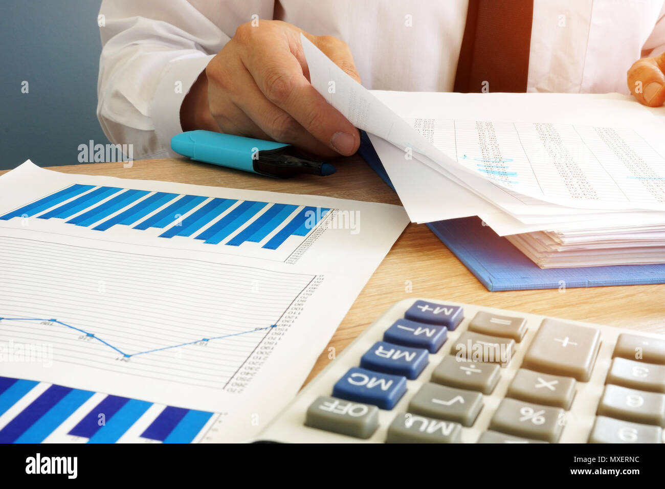 Businessman is checking financial documents. Paperwork in office Stock ...