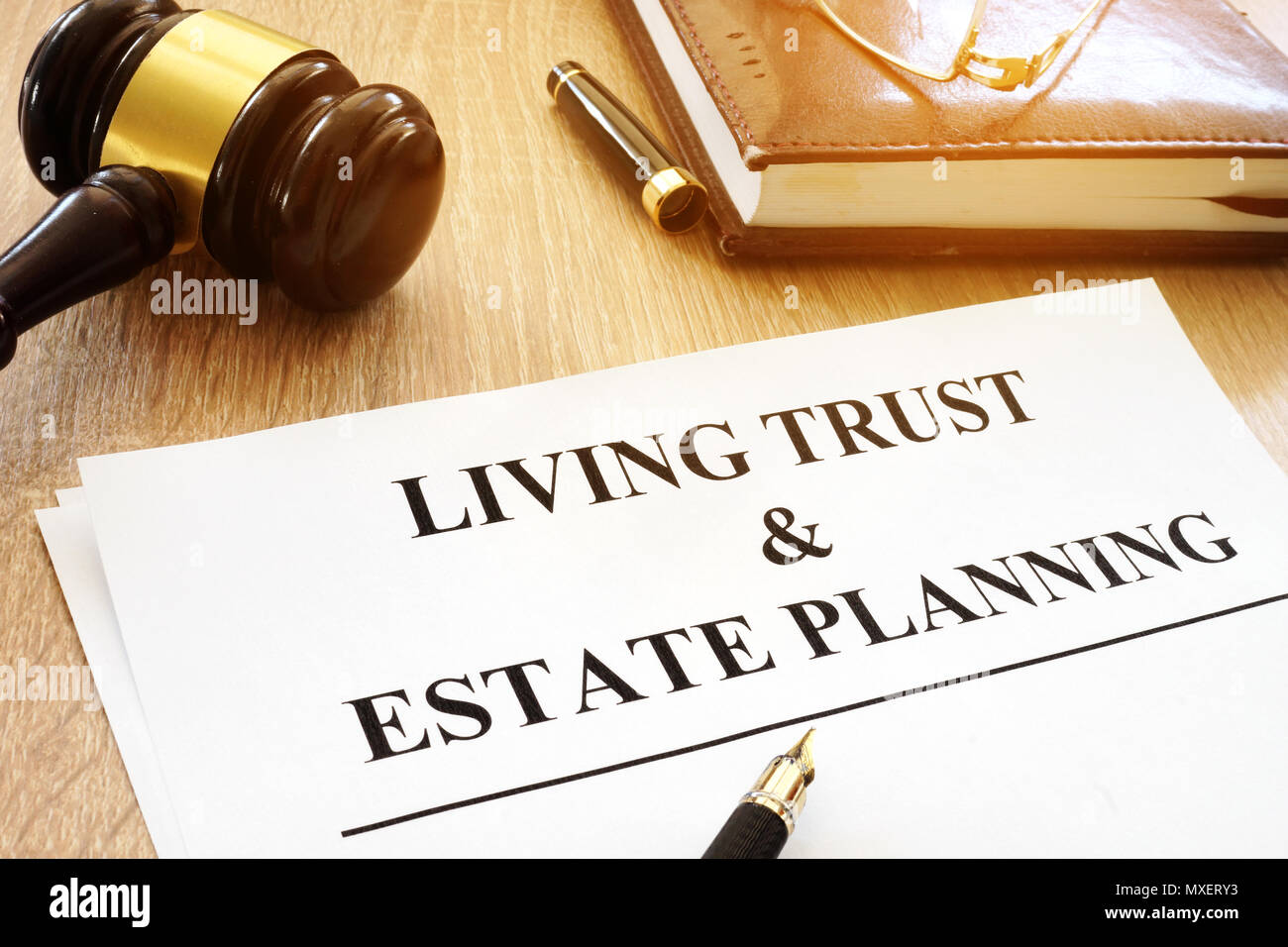 Living trust and estate planning form on a desk Stock Photo - Alamy