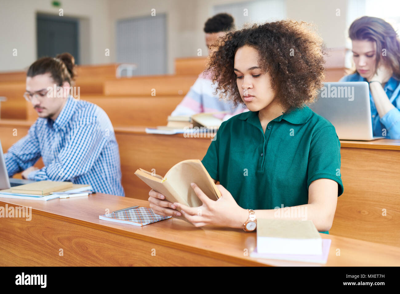 Adult study group book hi-res stock photography and images - Alamy
