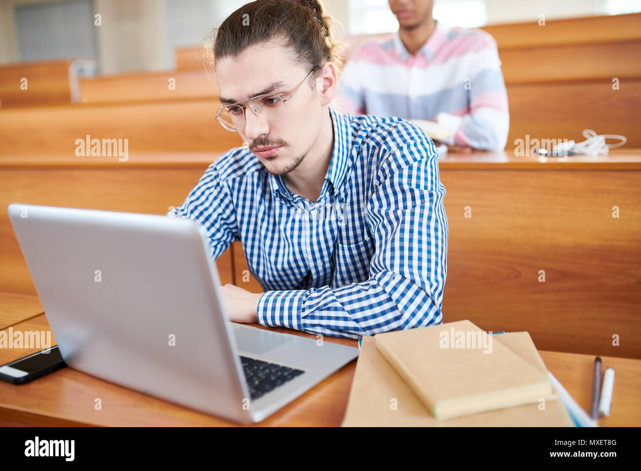 Student with laptop Stock Photo - Alamy