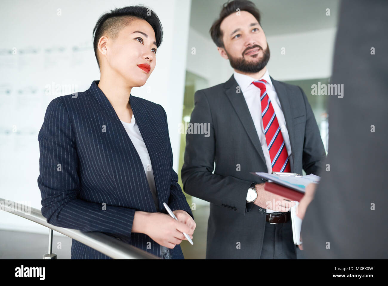 Business partners sharing ideas hi-res stock photography and images - Alamy