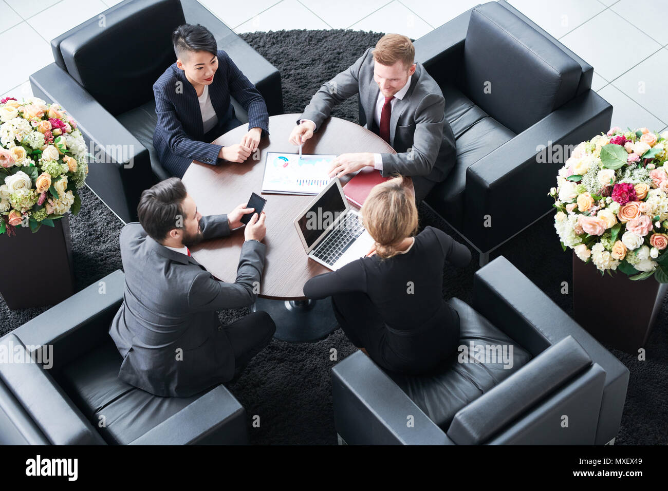 Businessperson in suit working hi-res stock photography and images - Alamy