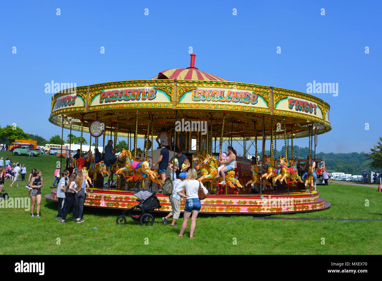 Fairground ride old fashioned merry go round ride hi-res stock ...
