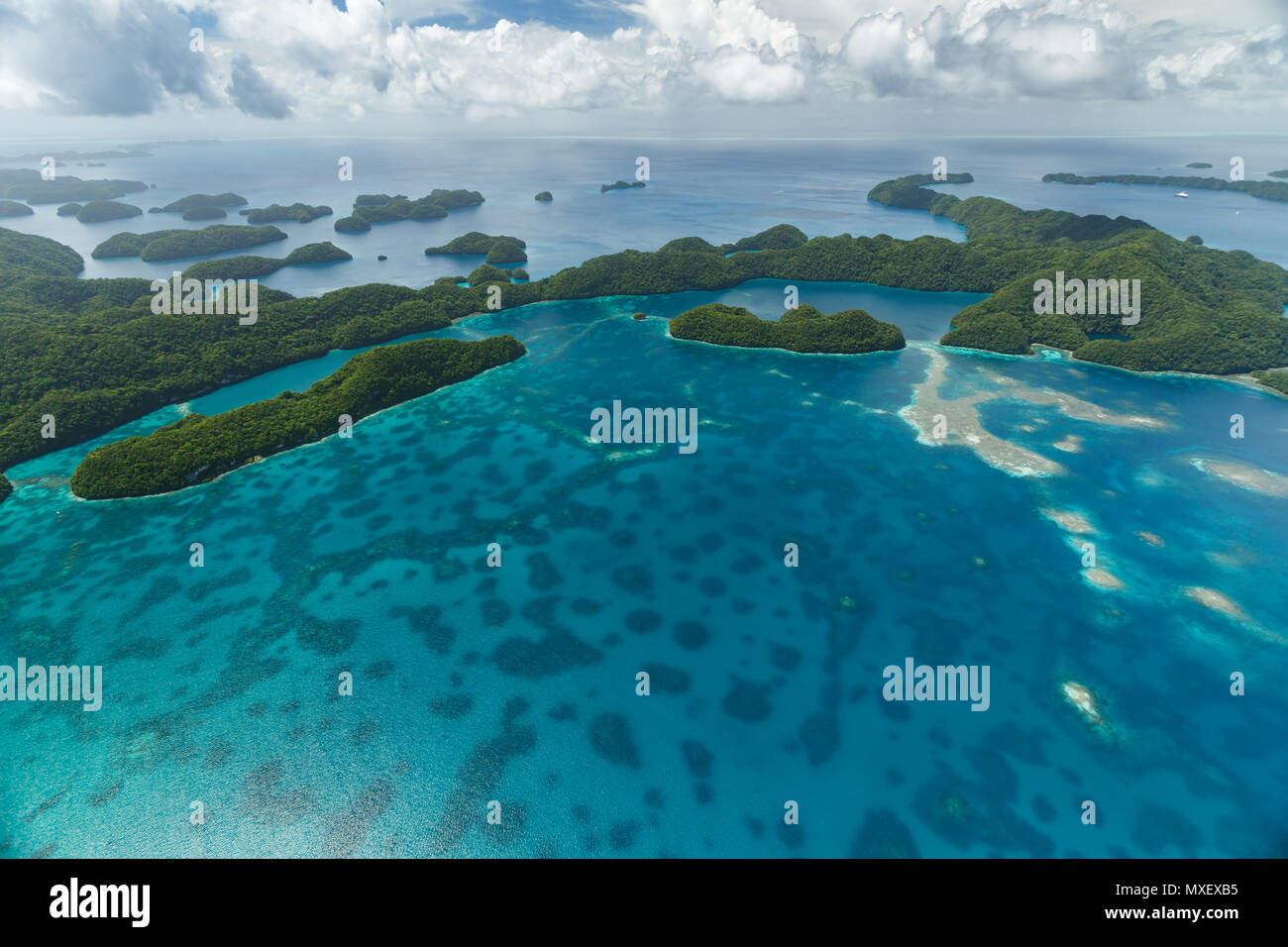 Aerial view of curious patterns of coral reefs, coral atolls, and ...