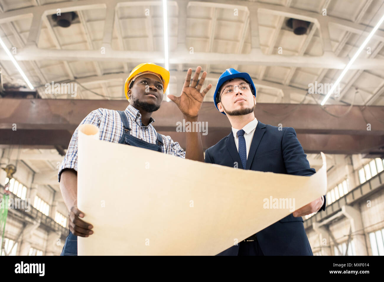 Overall production hi-res stock photography and images - Alamy