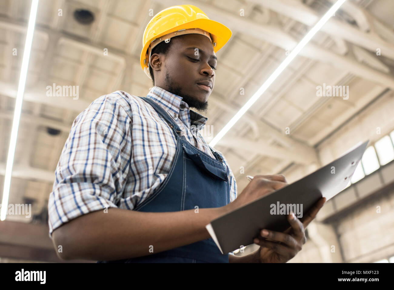 Taking Inventory at Plant Warehouse Stock Photo - Alamy