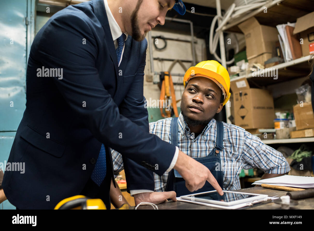 Work production boss hi-res stock photography and images - Alamy