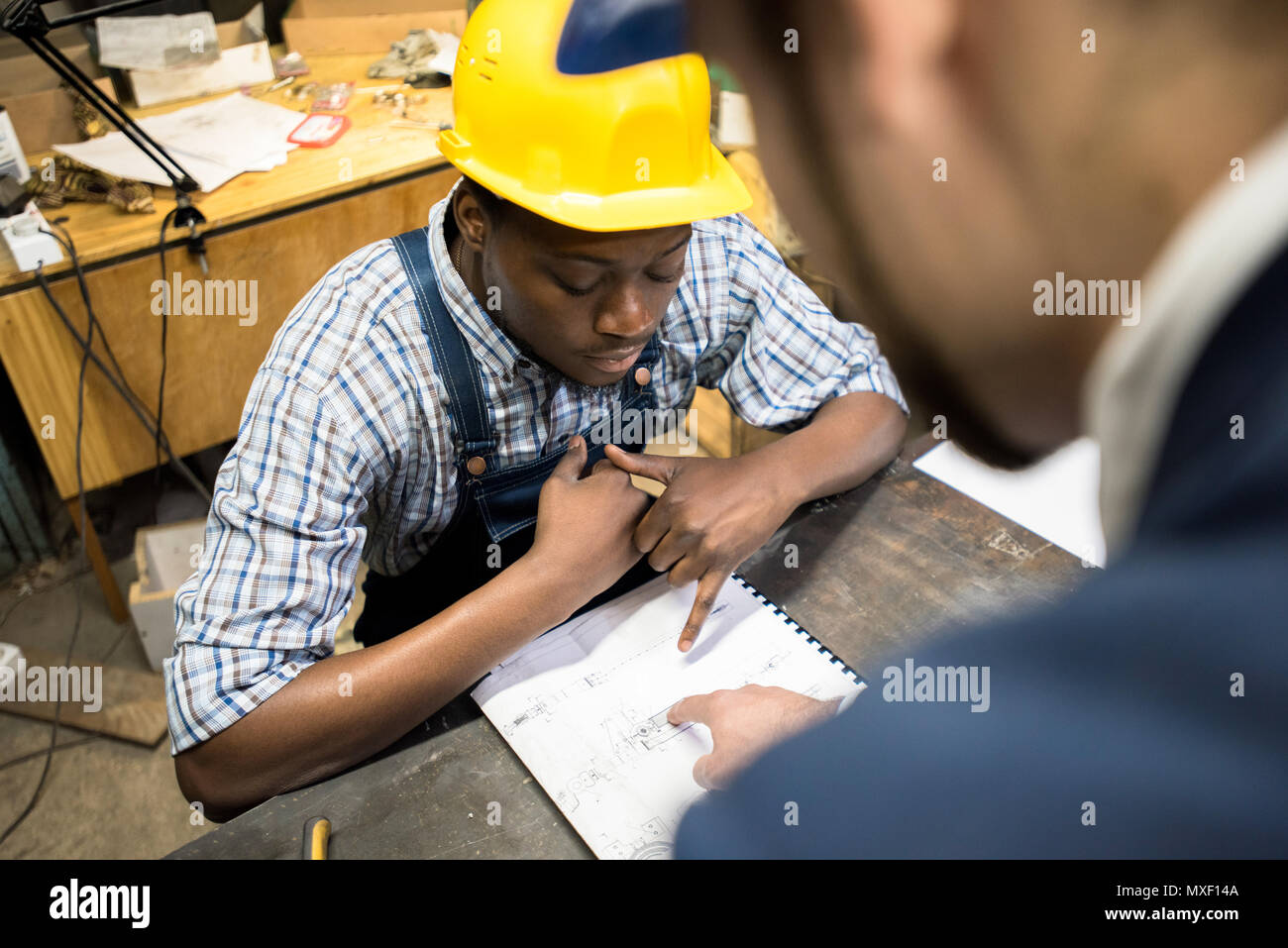 Lathe Operator Studying Detail Drawing Stock Photo - Alamy