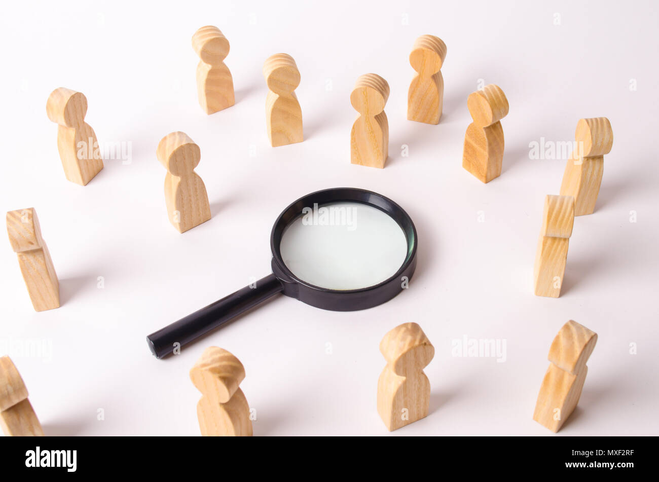 Wooden people magnifying glass hi-res stock photography and images - Alamy