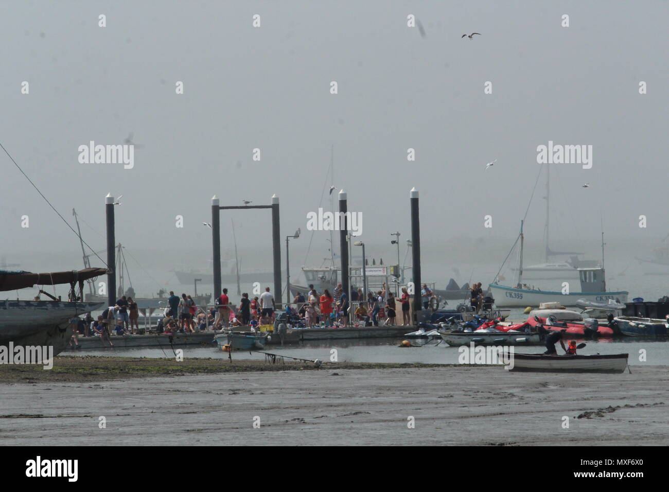 Coastal landscapes - A colourful hub of activity along the pier at ...