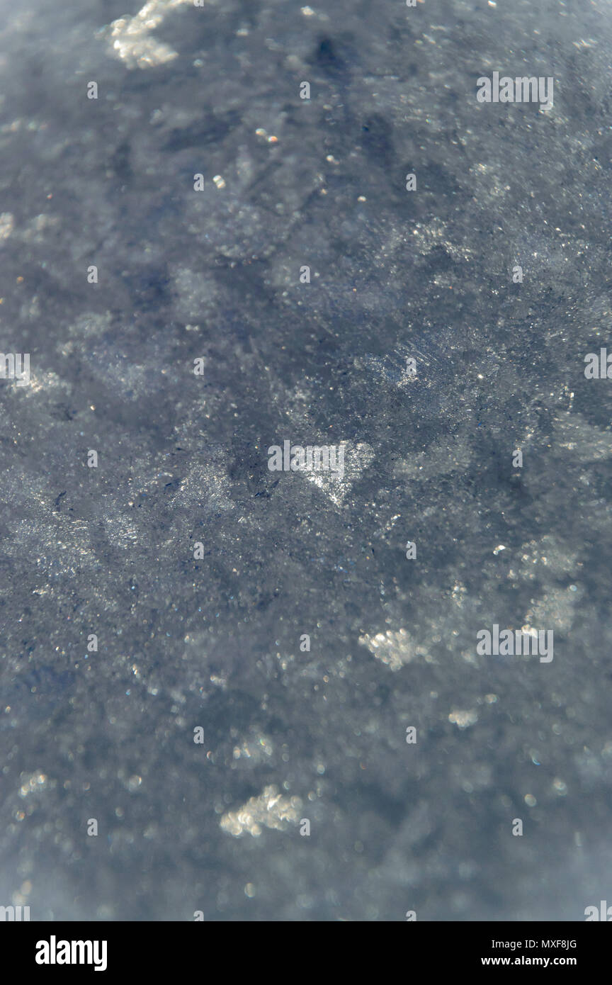 Sparkling snow flakes in winter sun Stock Photo - Alamy