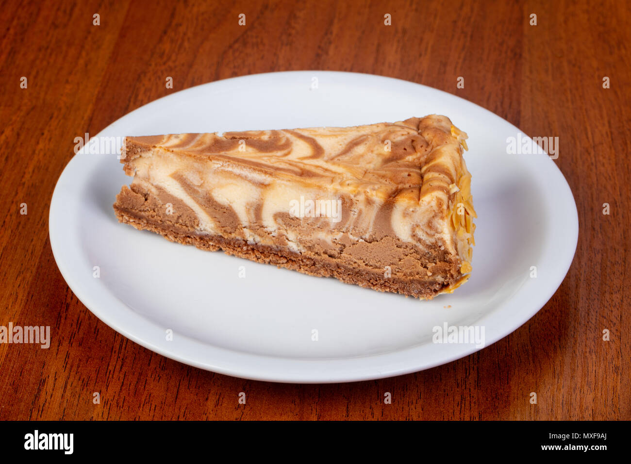 Tasty and sweet piece of cheesecake Stock Photo - Alamy