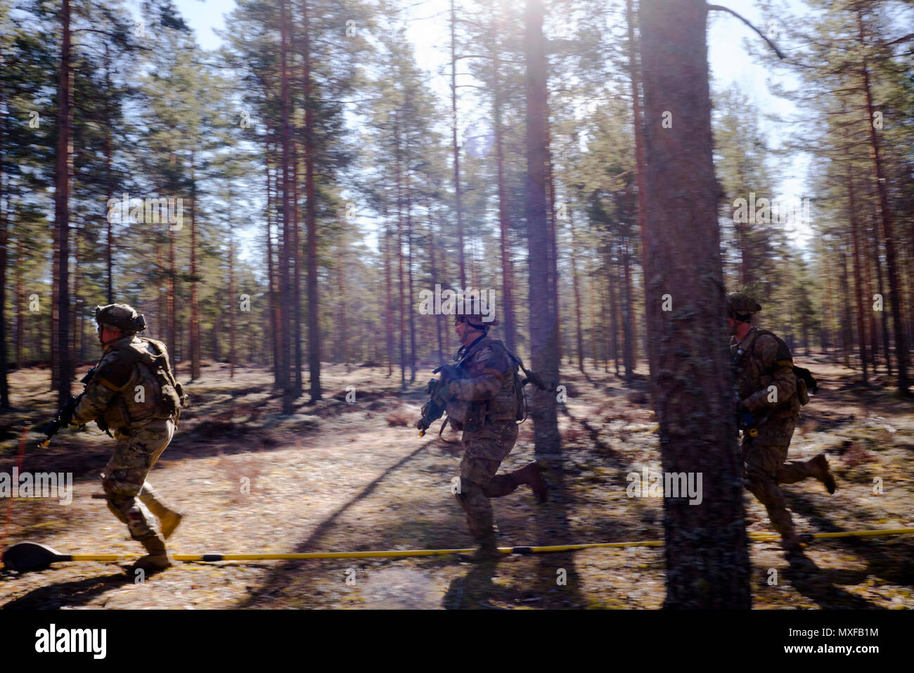 U.S. Soldiers of Apache Troop, 1st Squadron, 2nd Cavalry Regiment, run ...