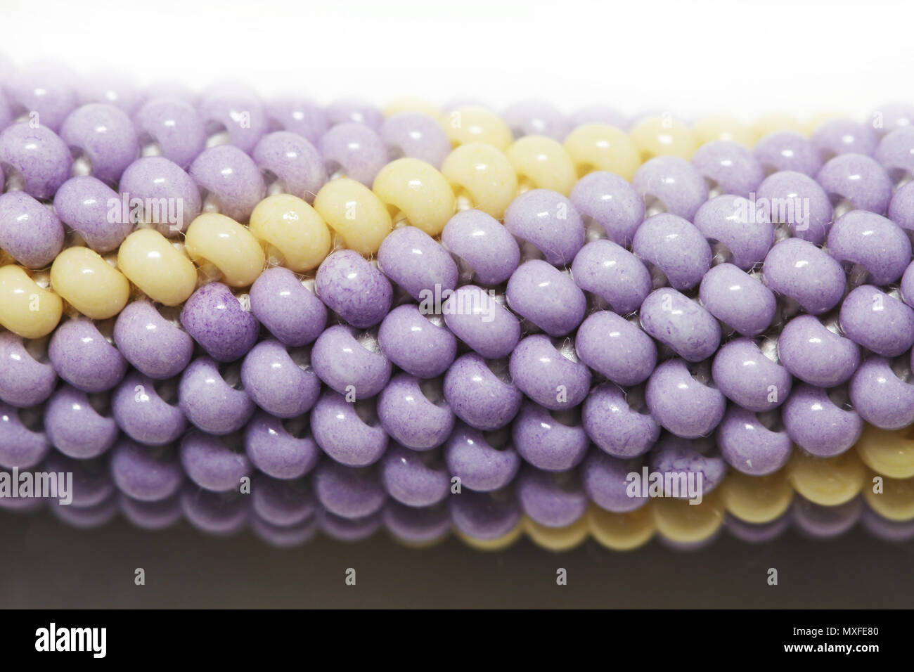 Close up necklace made of beads crochet detail Stock Photo - Alamy