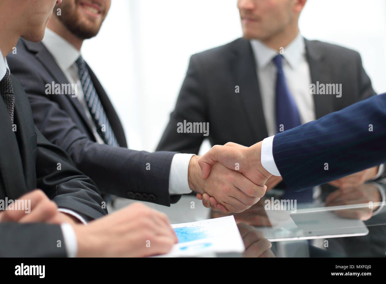 Business handshake. Close-up of business men shaking hands Stock Photo ...