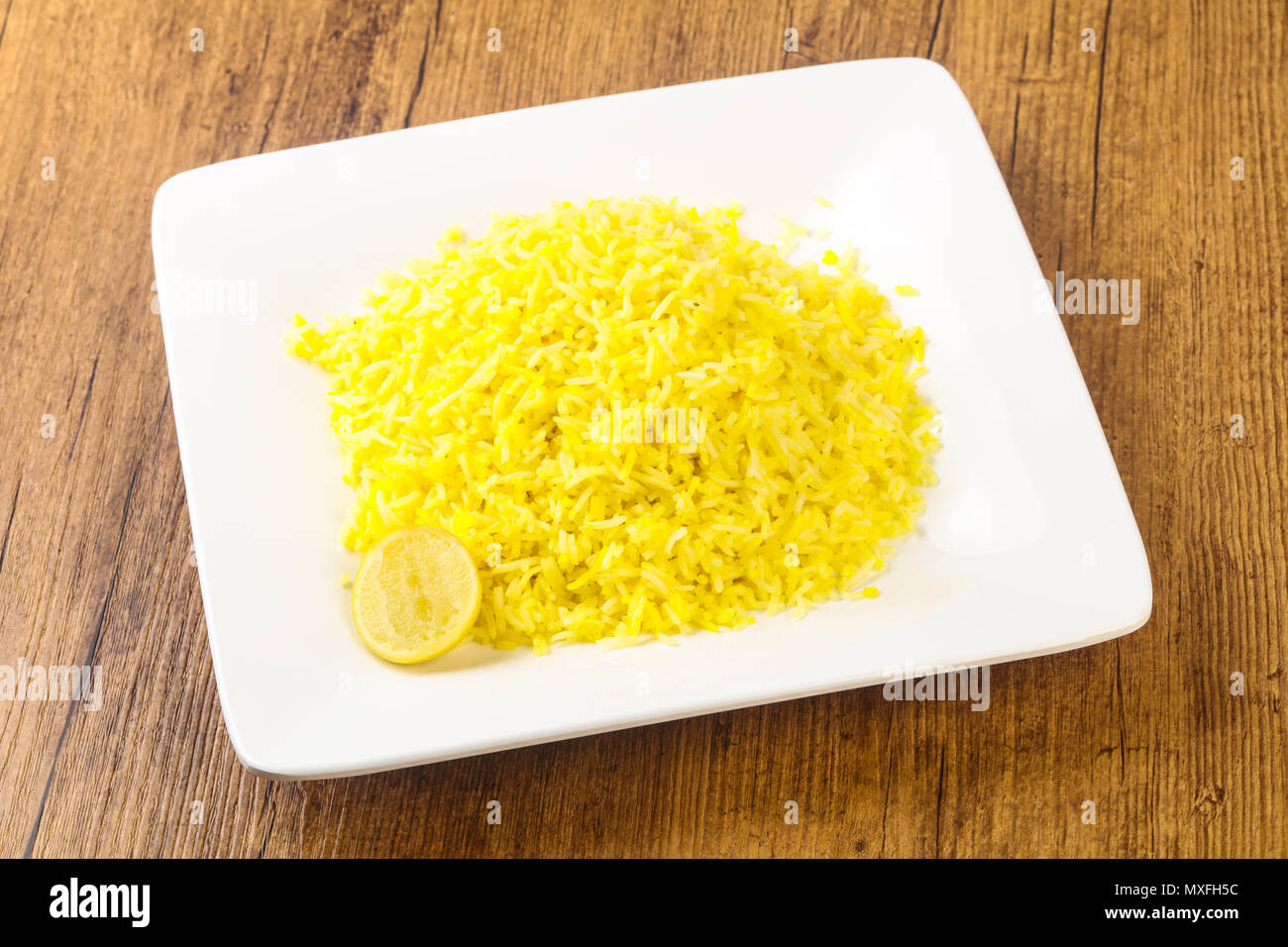 Indian traditional cuisine - Yellow Rice with Lime Stock Photo - Alamy