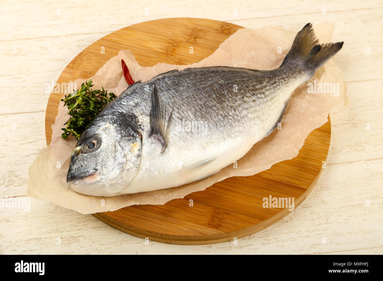raw dorada fish - ready for cooking Stock Photo - Alamy