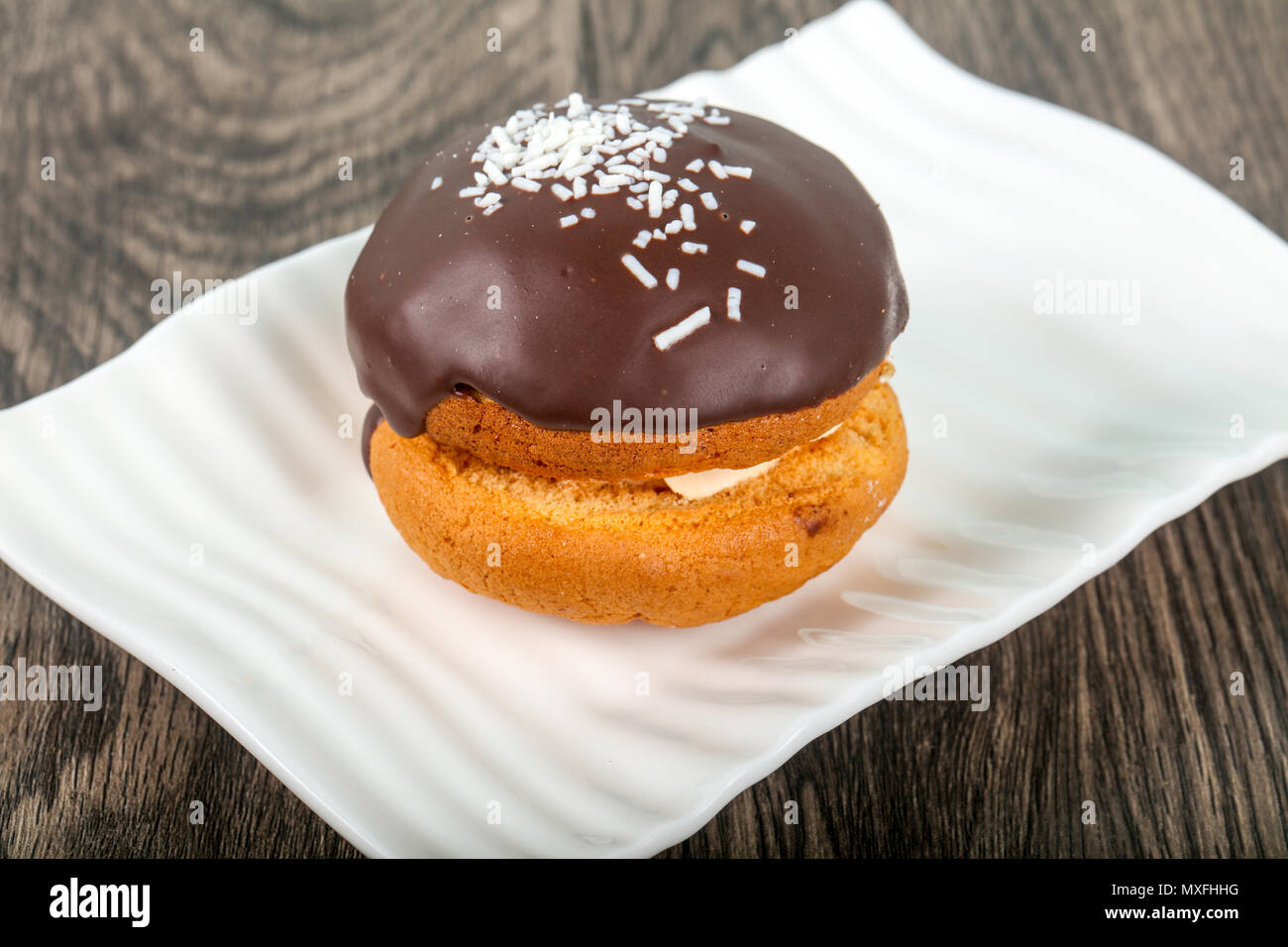 Bouchee cake with chocolate Stock Photo - Alamy