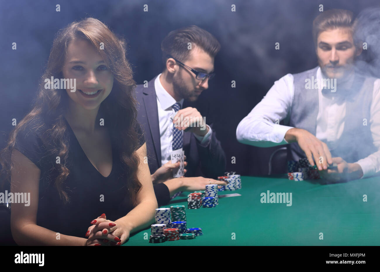 Woman evening gown sitting table hi-res stock photography and images ...