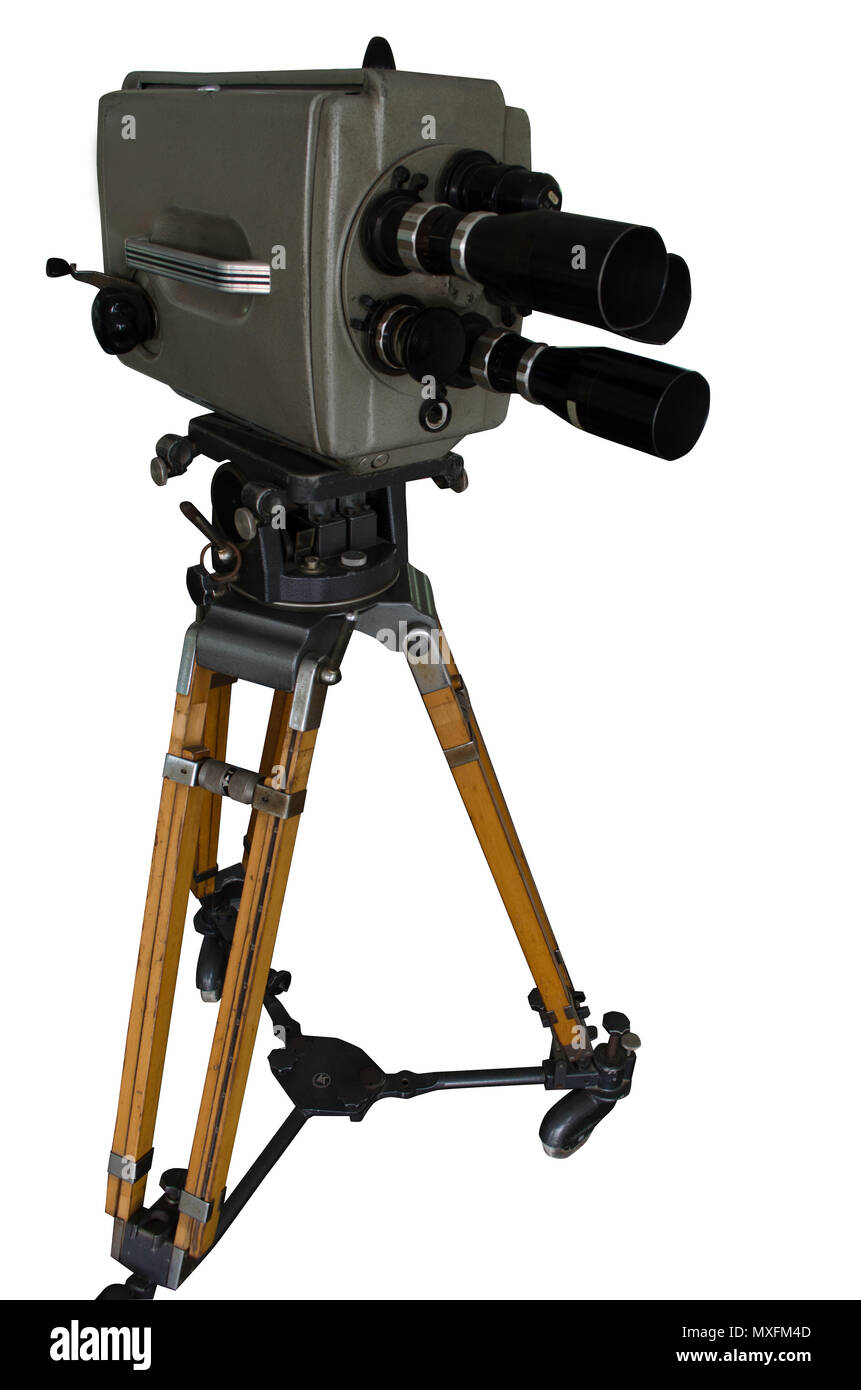 Old movie and television camera 16 mm with three lenses on white ...