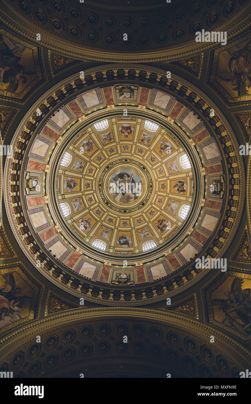 Interior of Roman catholic church St. Stephen's Basilica dome. Richly ...