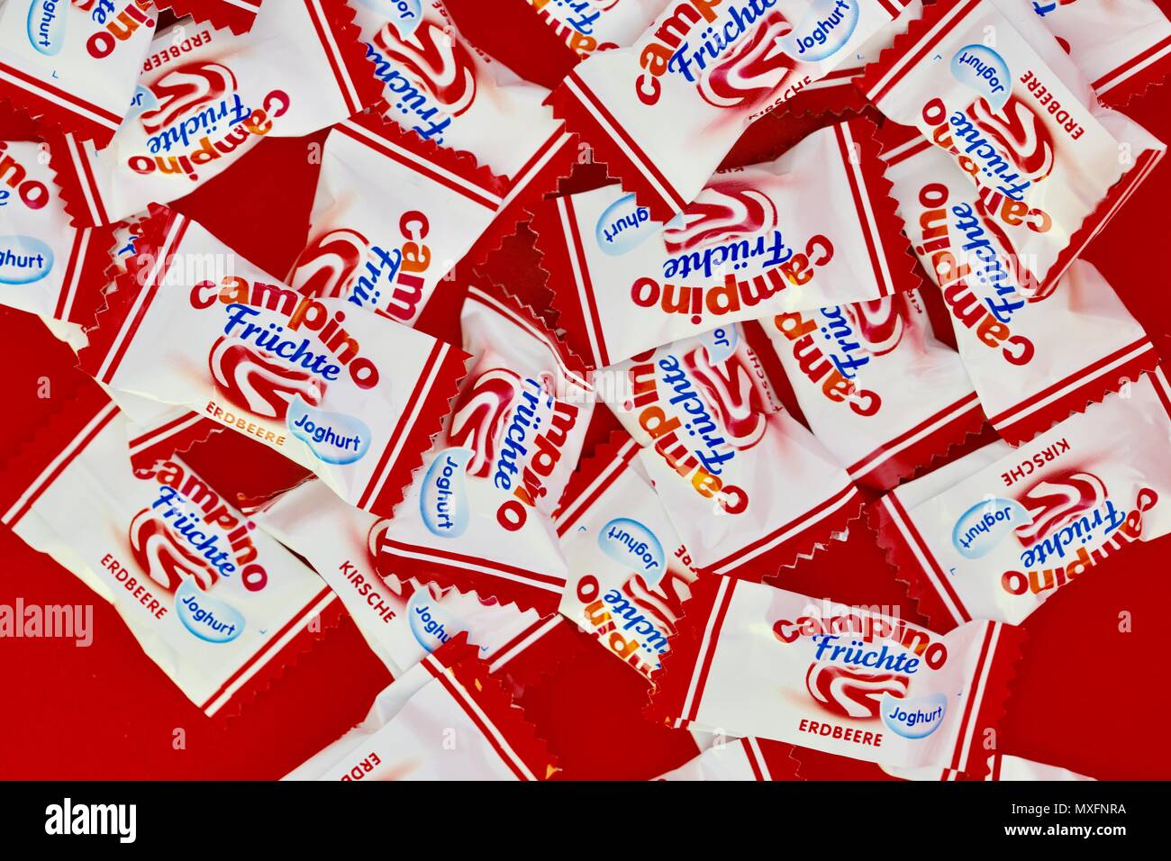 Campino boiled sweets, fruit and yogurt flavours, red background Stock ...