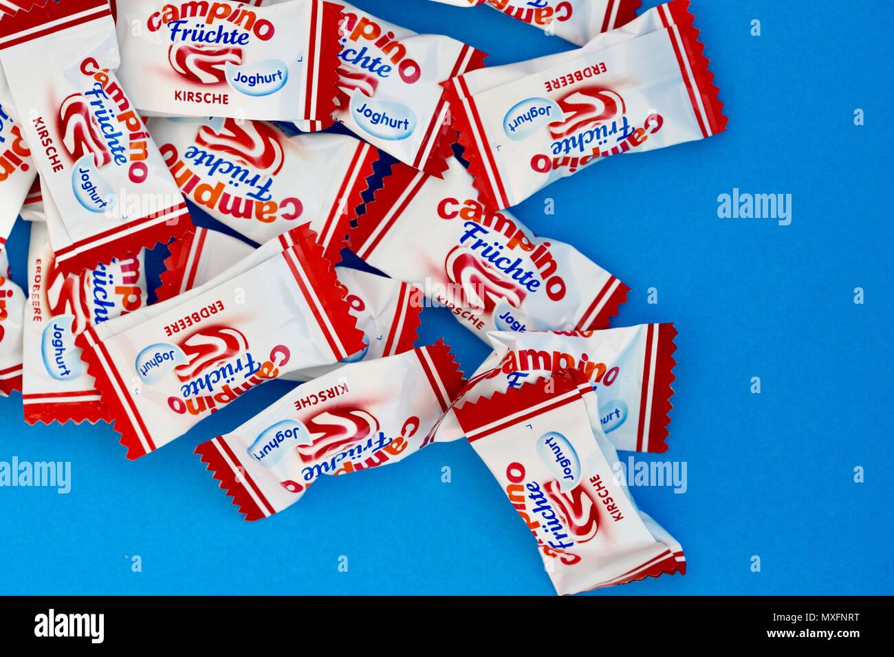 Campino boiled sweets, fruit and yogurt flavours, blue background Stock ...
