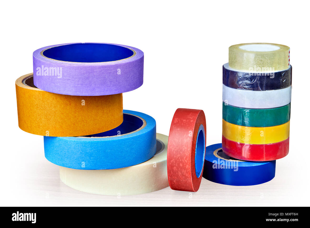 Several rolls of masking tape and stack of electrical tape isolated on ...