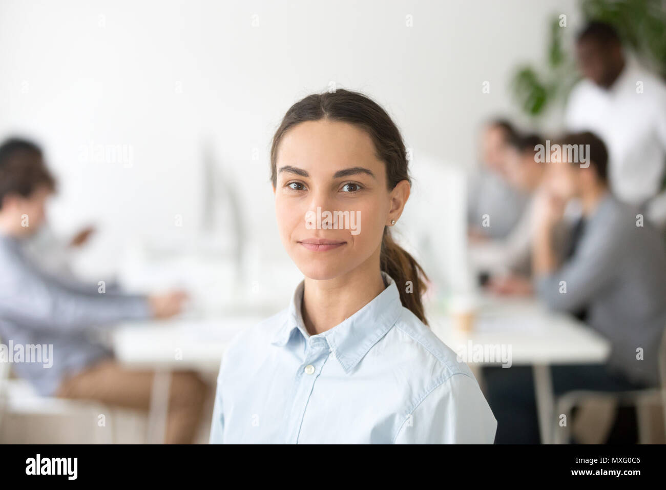 Lady looking at colleague hi-res stock photography and images - Alamy