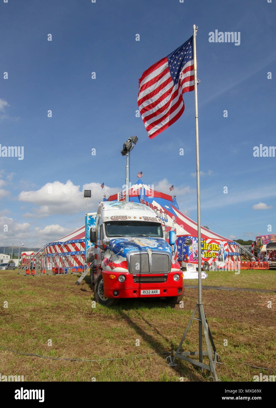 A brightly coloured American style truck used for circus work with ...