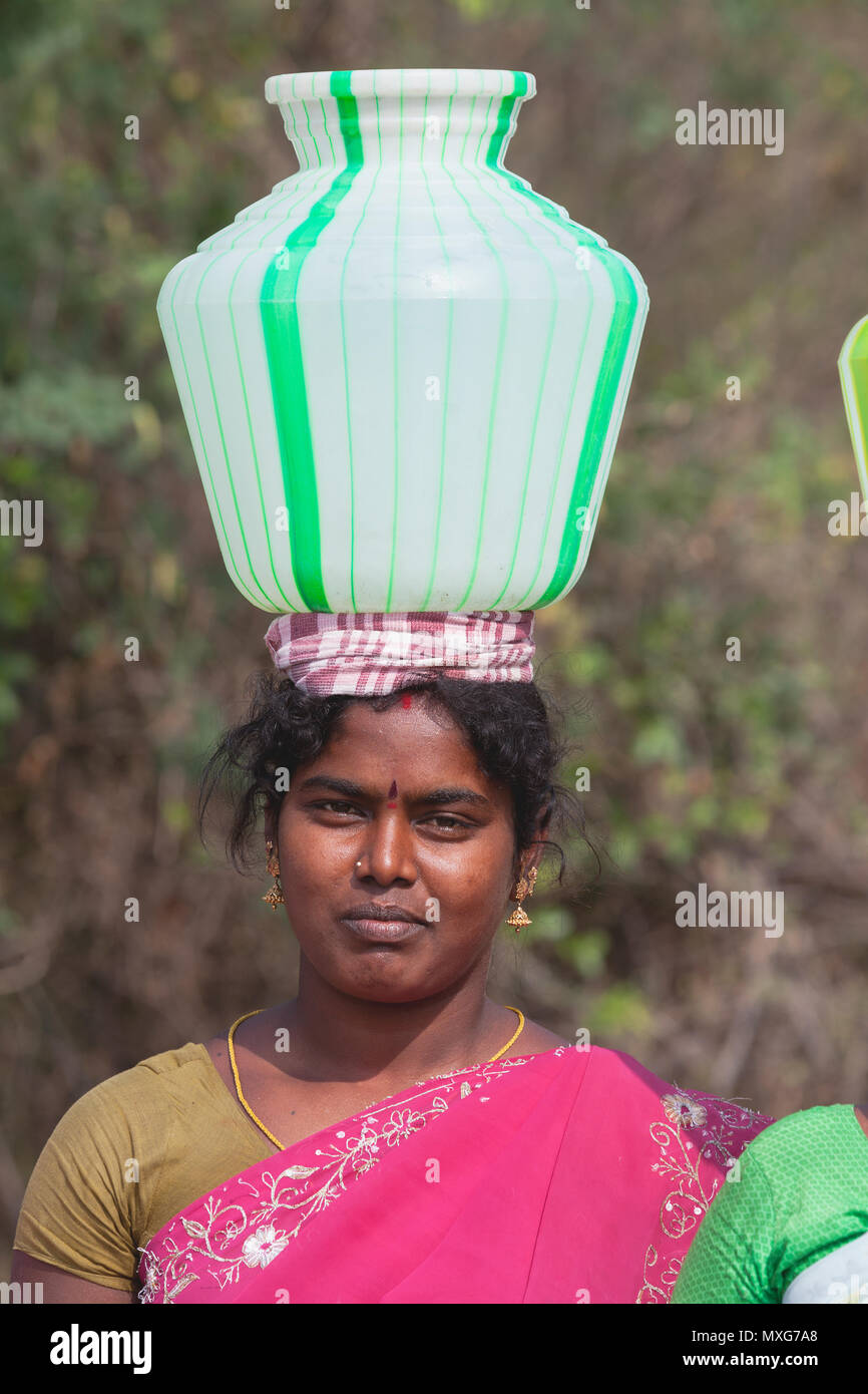 Tamil women carrying pots on hi-res stock photography and images - Alamy