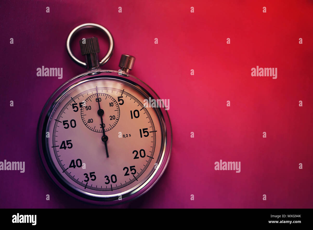 Old stopwatch isolated on paper bright background top view. Concept of ...