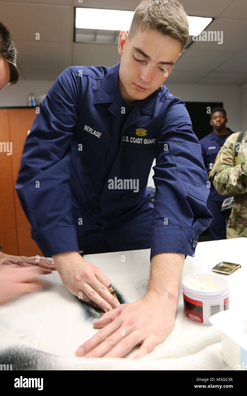 U.S. Coast Guard Seaman Daniel Berlage, a non-rate with the United ...