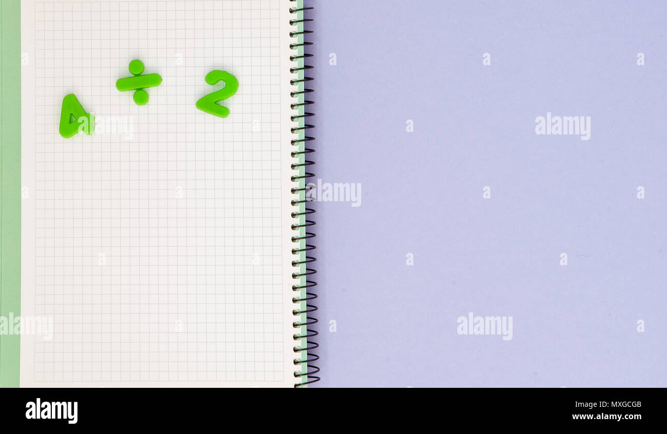 Learning maths. Kid's desk with blank notebook and numbers top view ...