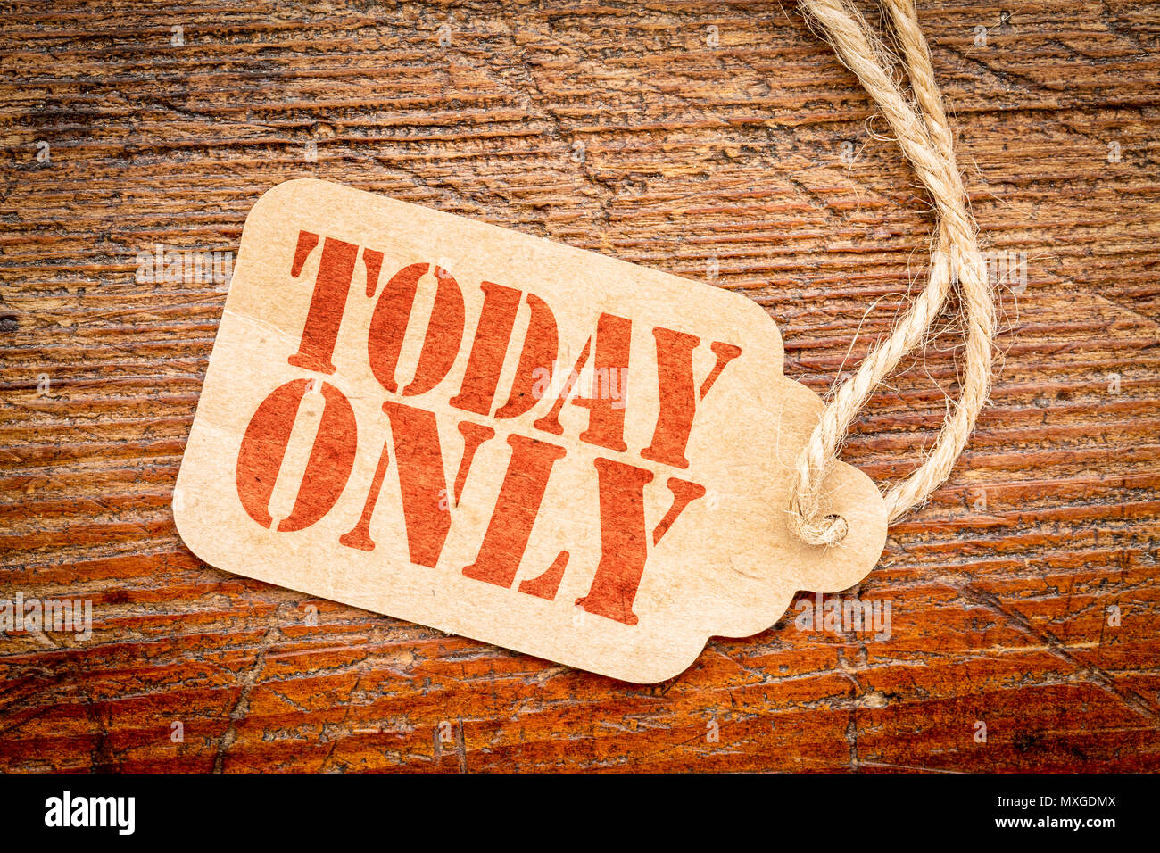 today only sign - red stencil text on a cardboard price tag against ...
