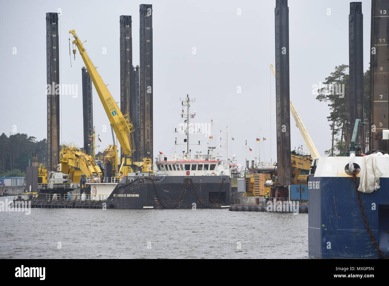 04 June 2018, Germany, Lubmin: Dredgers used for under water digging ...