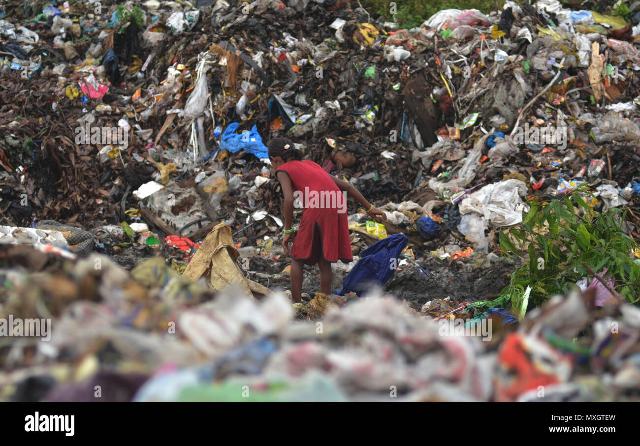 Dimapur, India - 4th June 2018: An Indian child ragpicker looks on ...