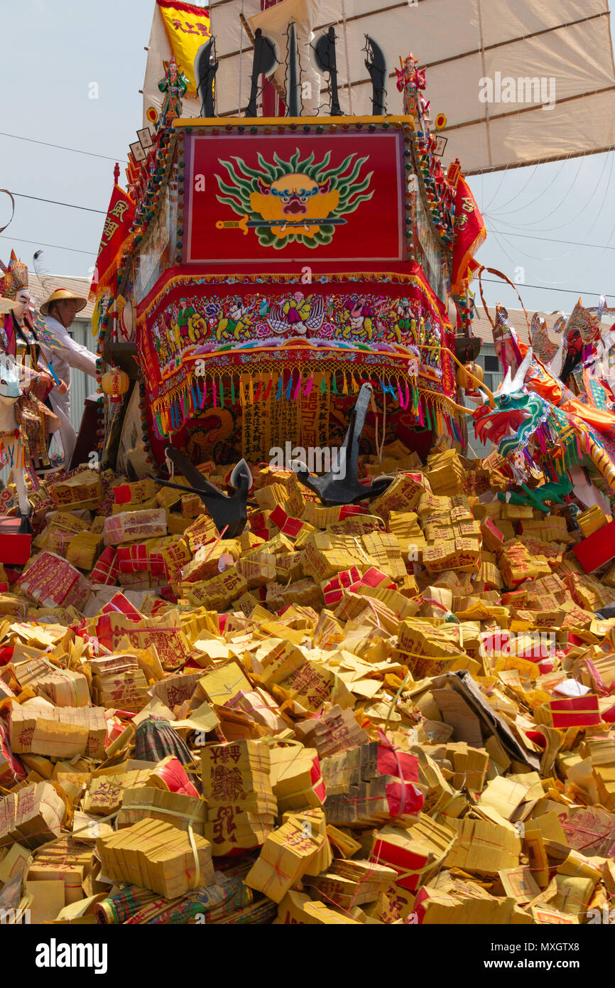 Xigang, Taiwan, 4 June, 2018: The King Boat surfs on a wave of ghost ...