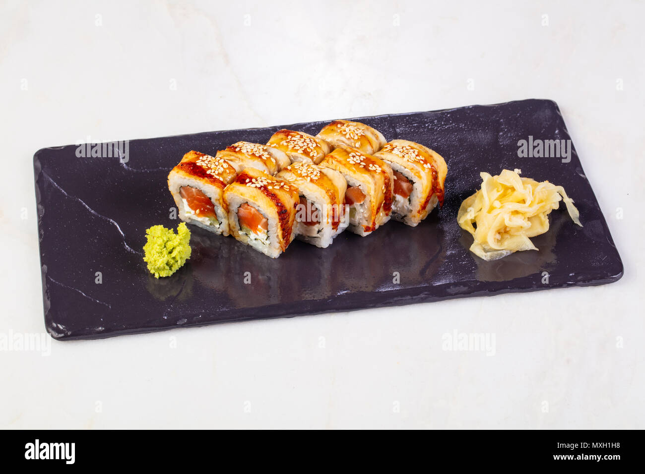 Canada roll with eel and wasabi Stock Photo - Alamy