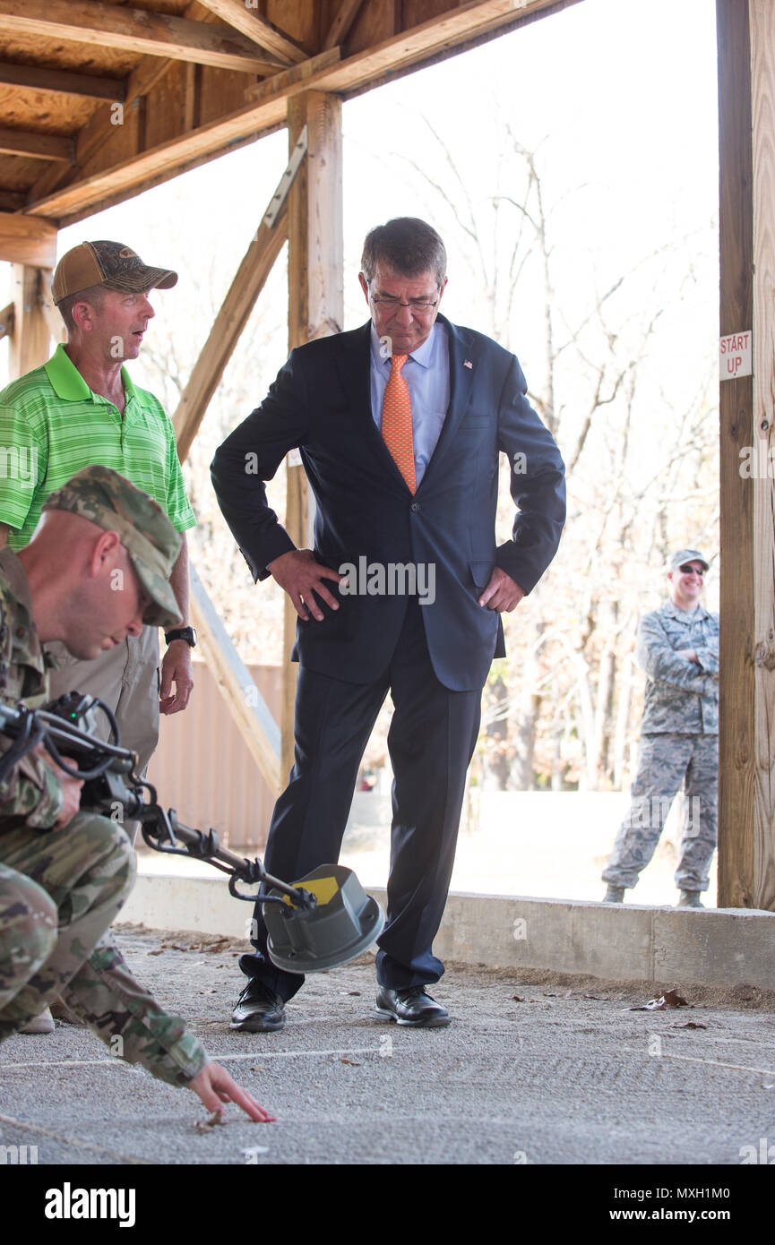 Secretary of Defense Ash receives a brief on mine detectors during an ...