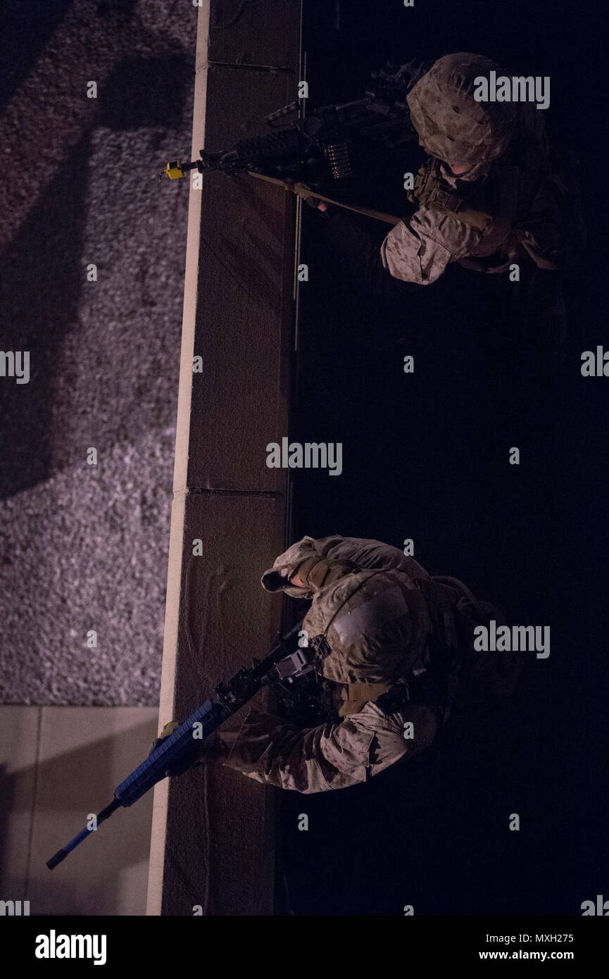 U.S. Marines from the Marine Special Operations Command scan their ...