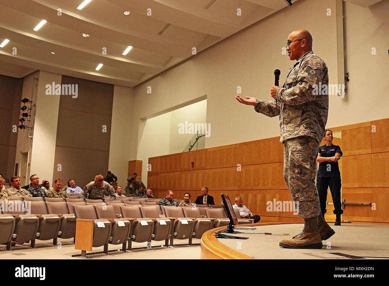 Air Force Tech. Sgt. Julius Delos Reyes, a photo journalist assigned to ...