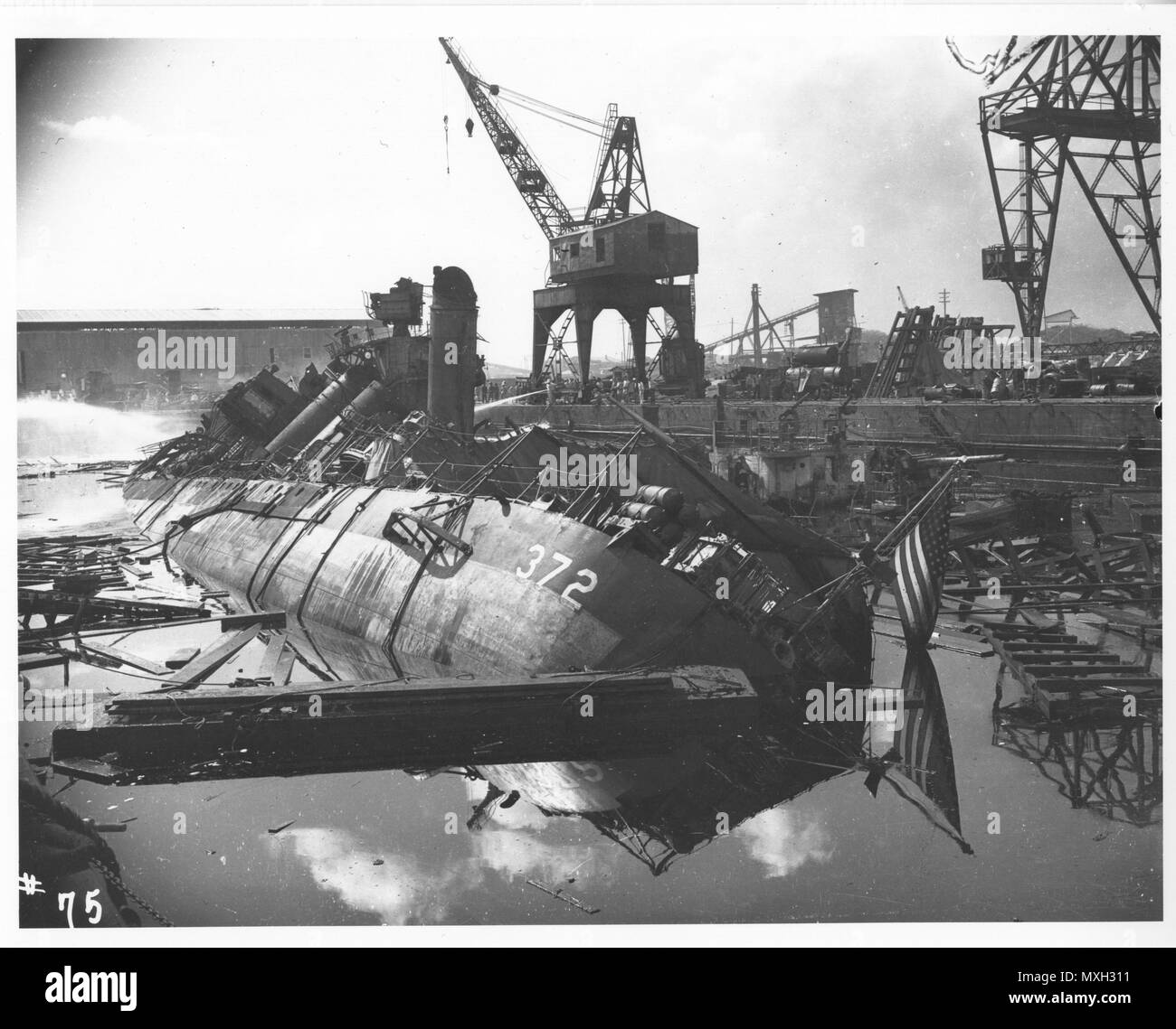 Original caption: Damaged ships after the Japanese attack on Pearl ...